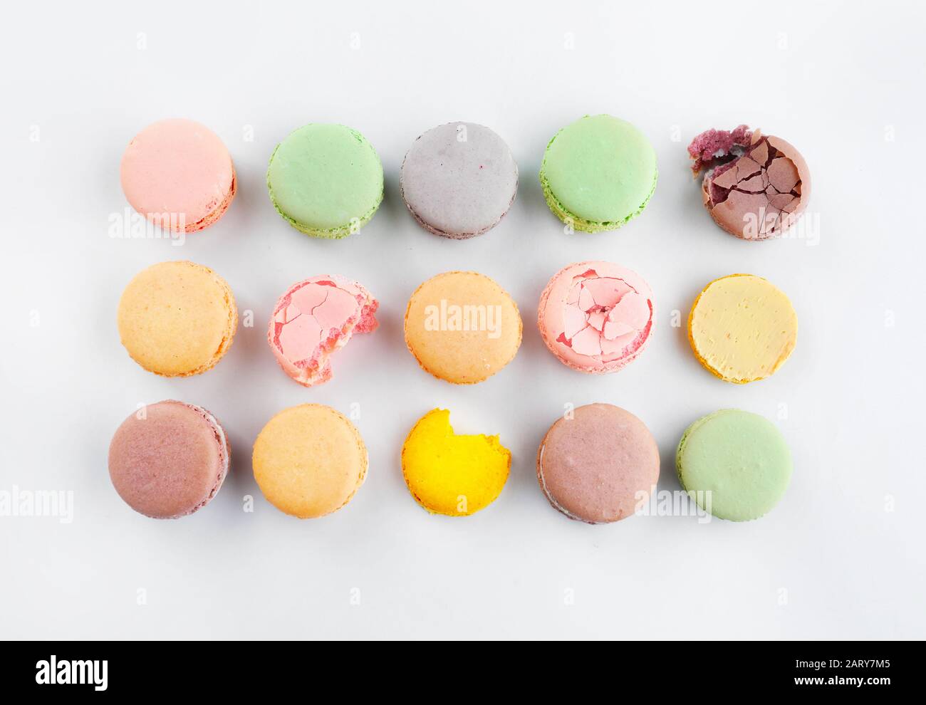 Different tasty macarons on white background Stock Photo - Alamy