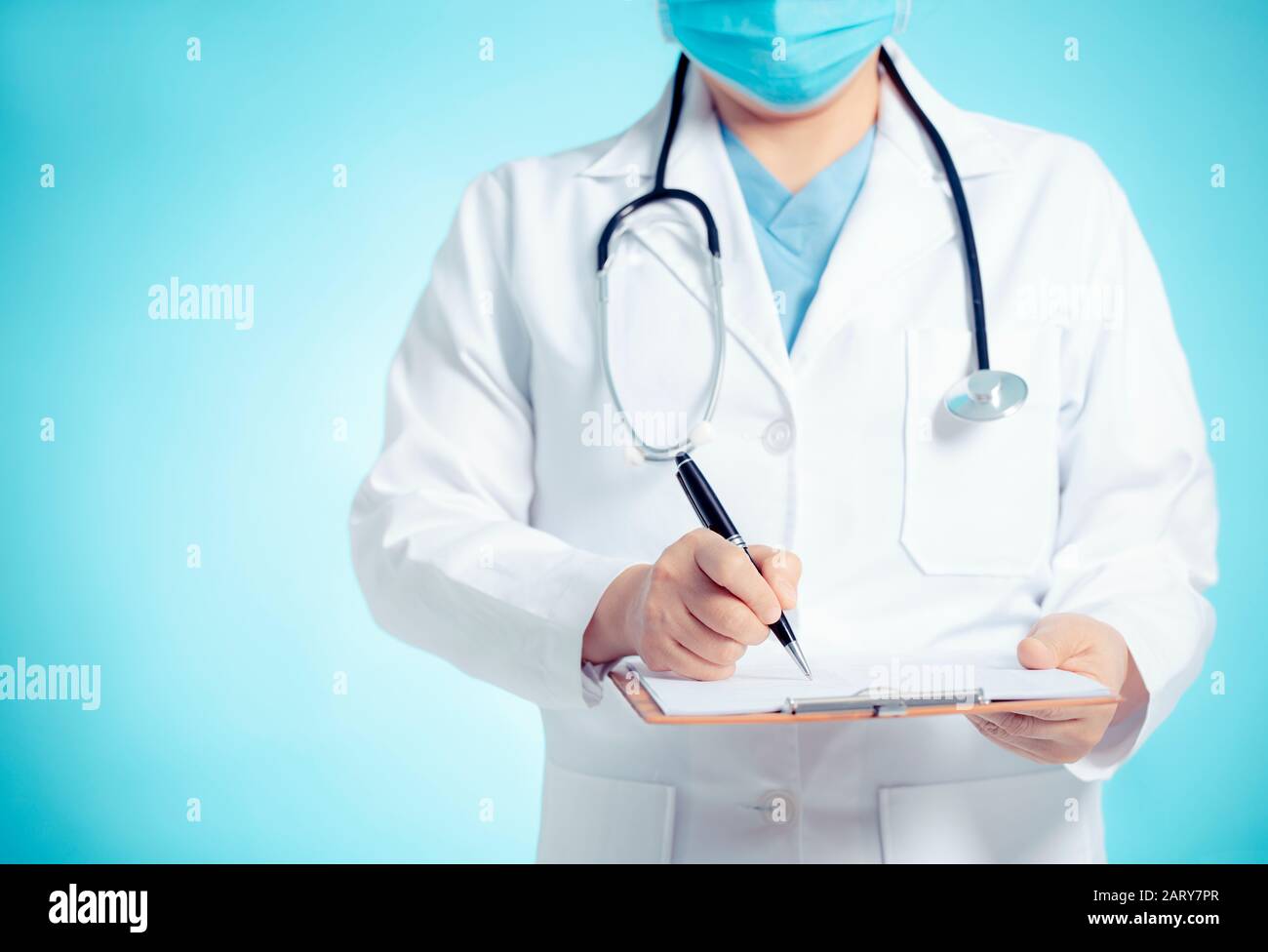 closeup doctor’s hands is writing medical report Stock Photo - Alamy