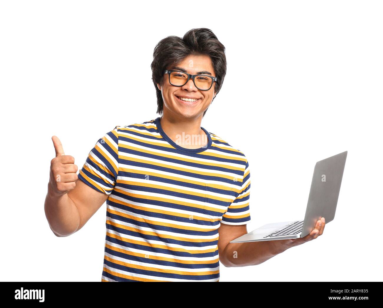 Male Asian Programmer With Laptop Showing Thumb Up Gesture On White