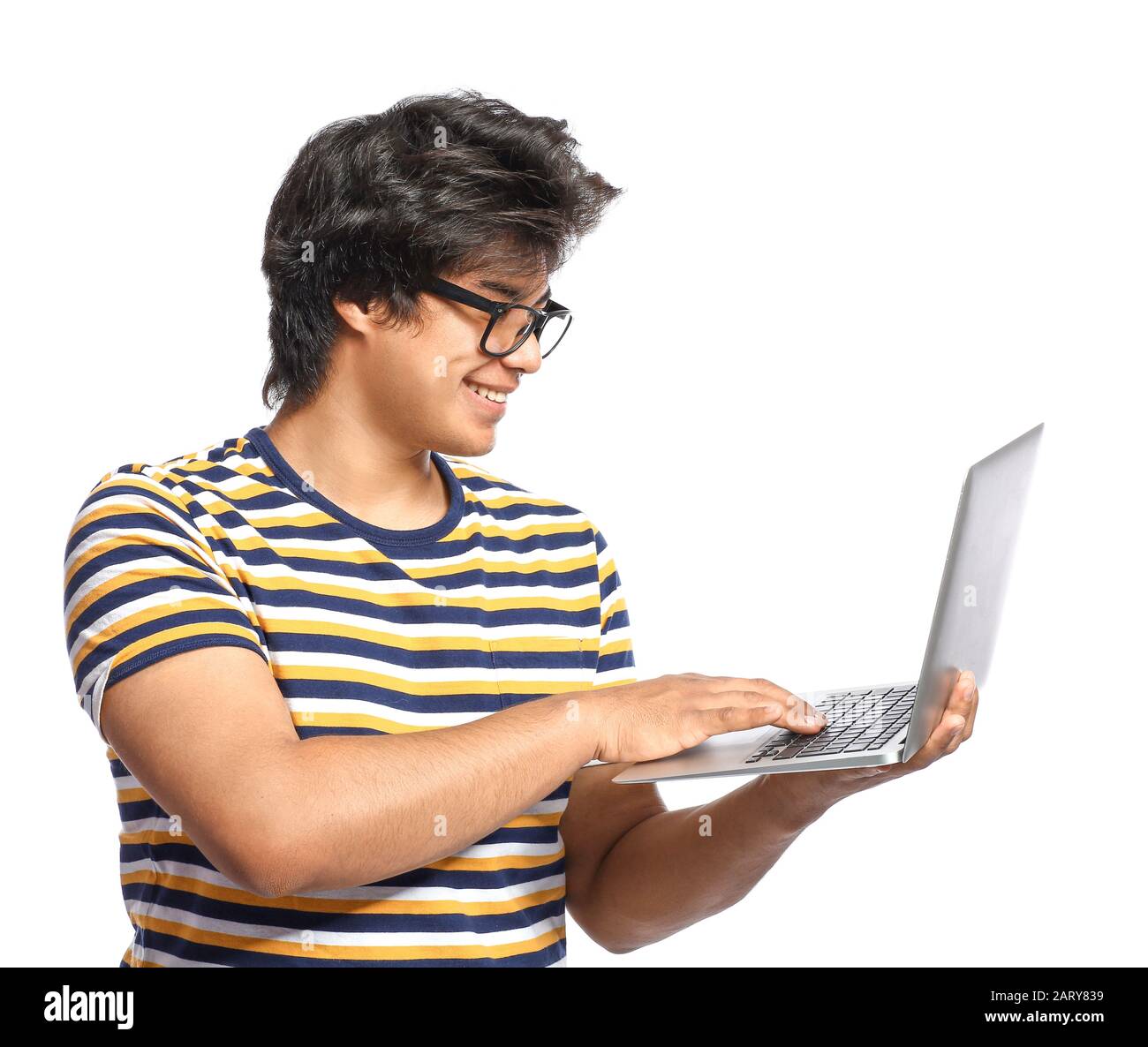 Male Asian programmer with laptop on white background Stock Photo - Alamy