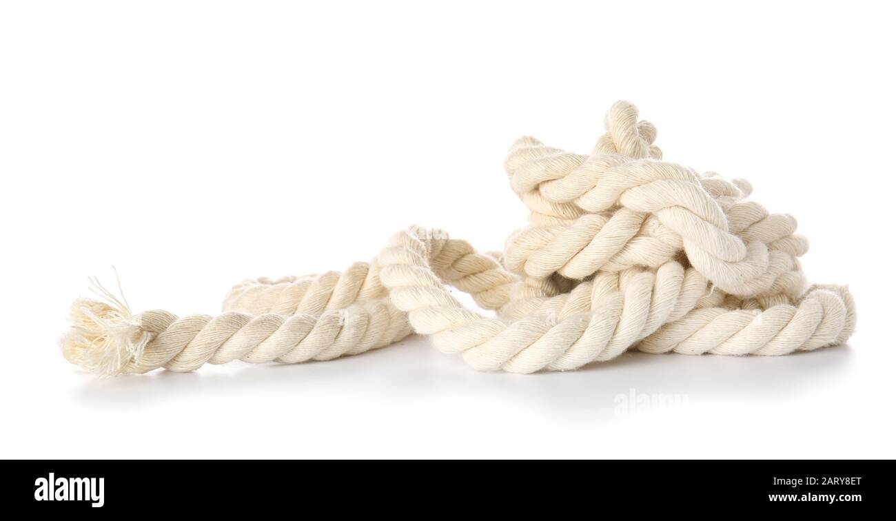 Rolled rope on white background Stock Photo - Alamy