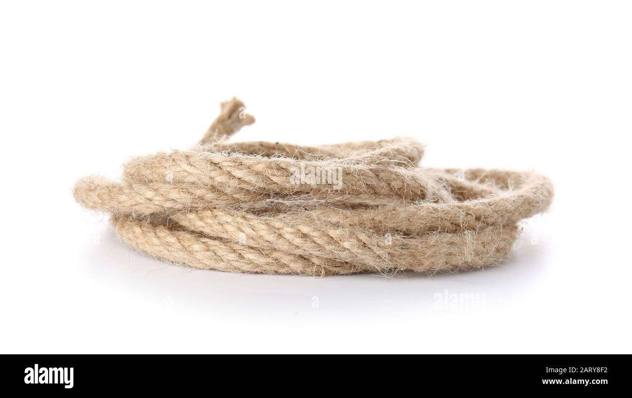 Rolled rope on white background Stock Photo - Alamy