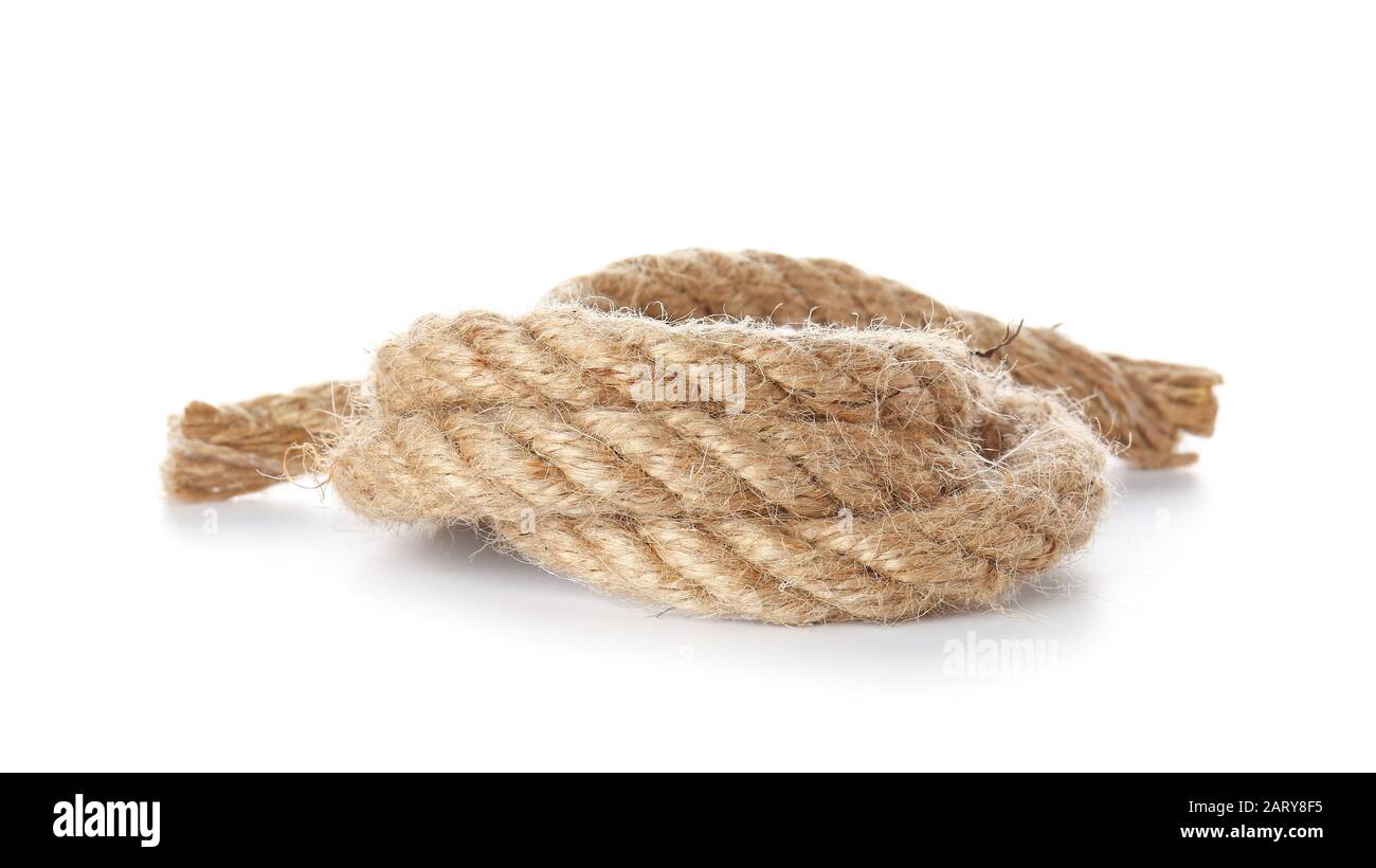 Rolled rope on white background Stock Photo - Alamy