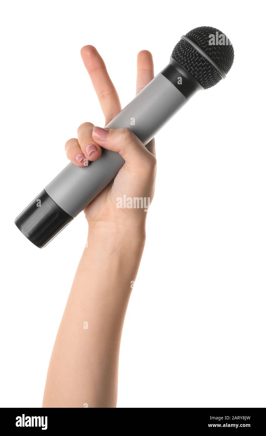 Female hand with microphone on white background Stock Photo - Alamy