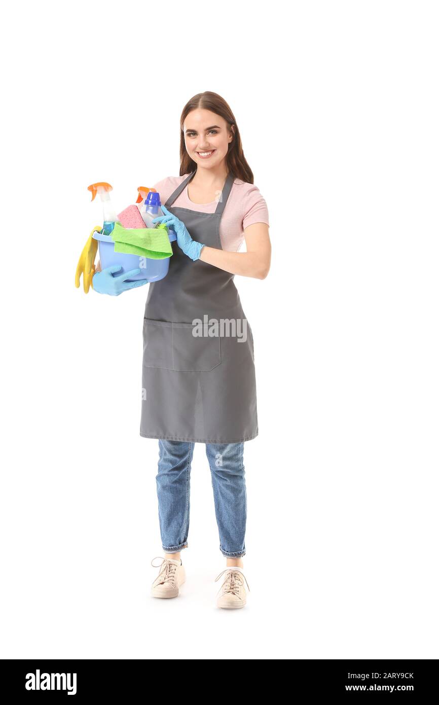 Female janitor with cleaning supplies on white background Stock Photo ...