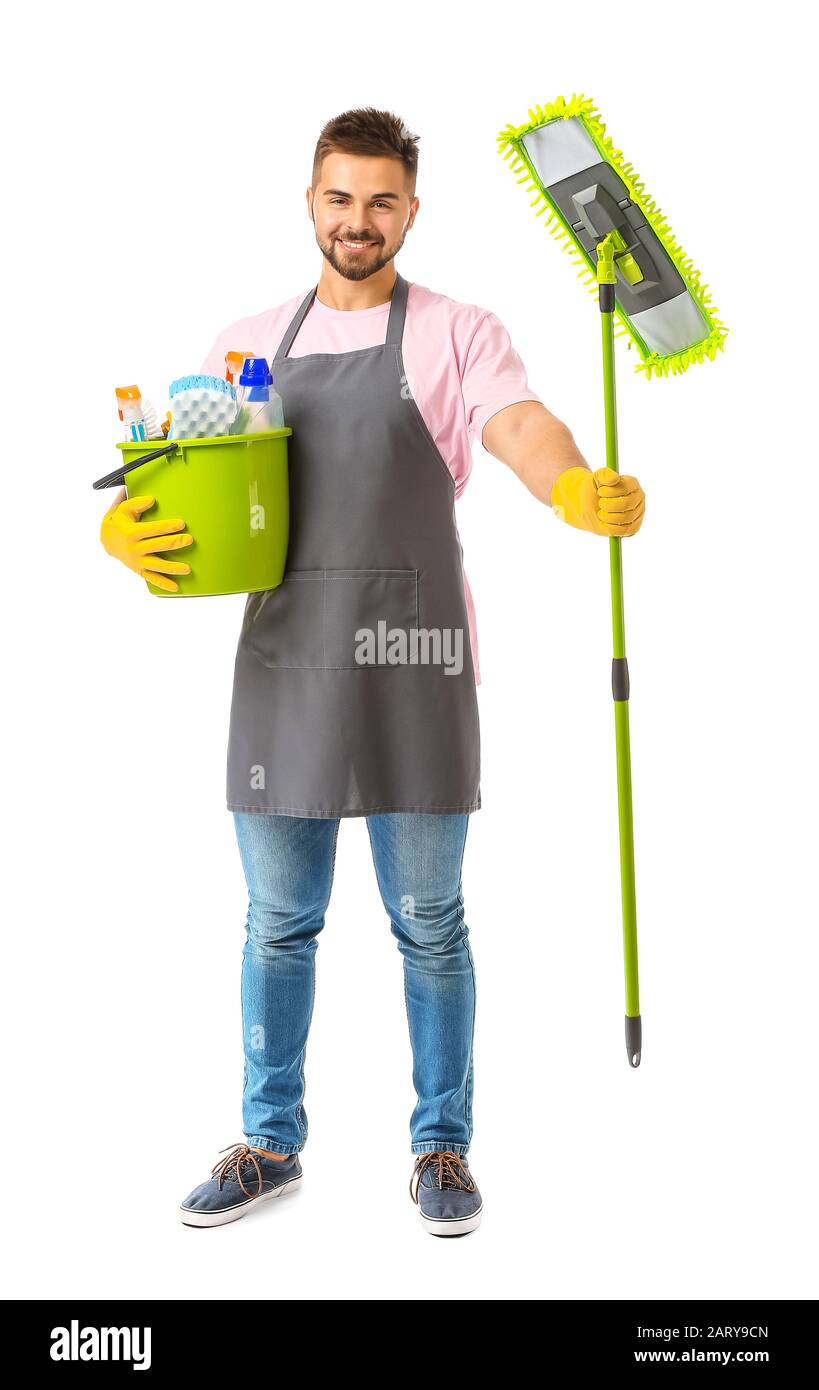Male janitor with cleaning supplies on white background Stock Photo - Alamy