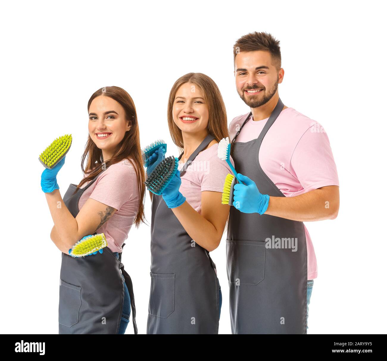 Team of janitors on white background Stock Photo - Alamy
