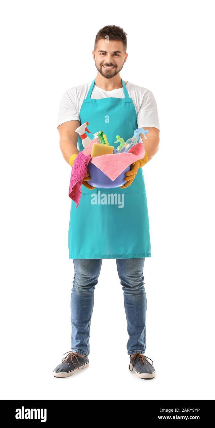 Male janitor with cleaning supplies on white background Stock Photo - Alamy