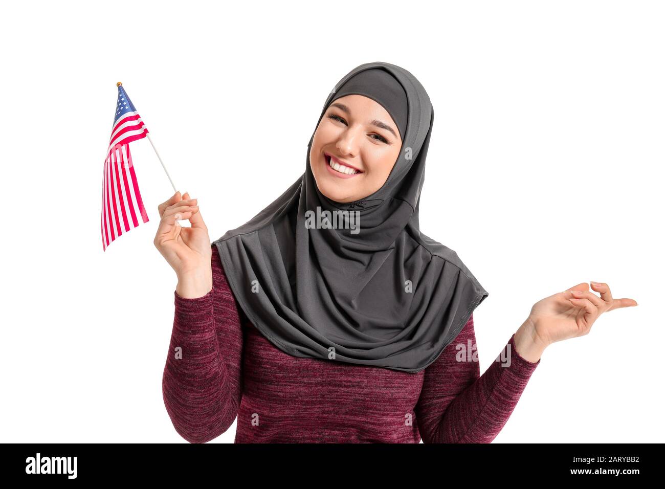 Beautiful Muslim woman with USA flag on white background Stock Photo ...
