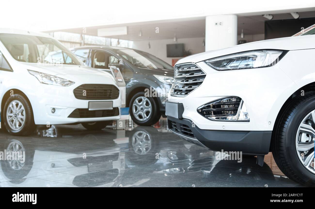 Interior of modern salon with new cars Stock Photo - Alamy
