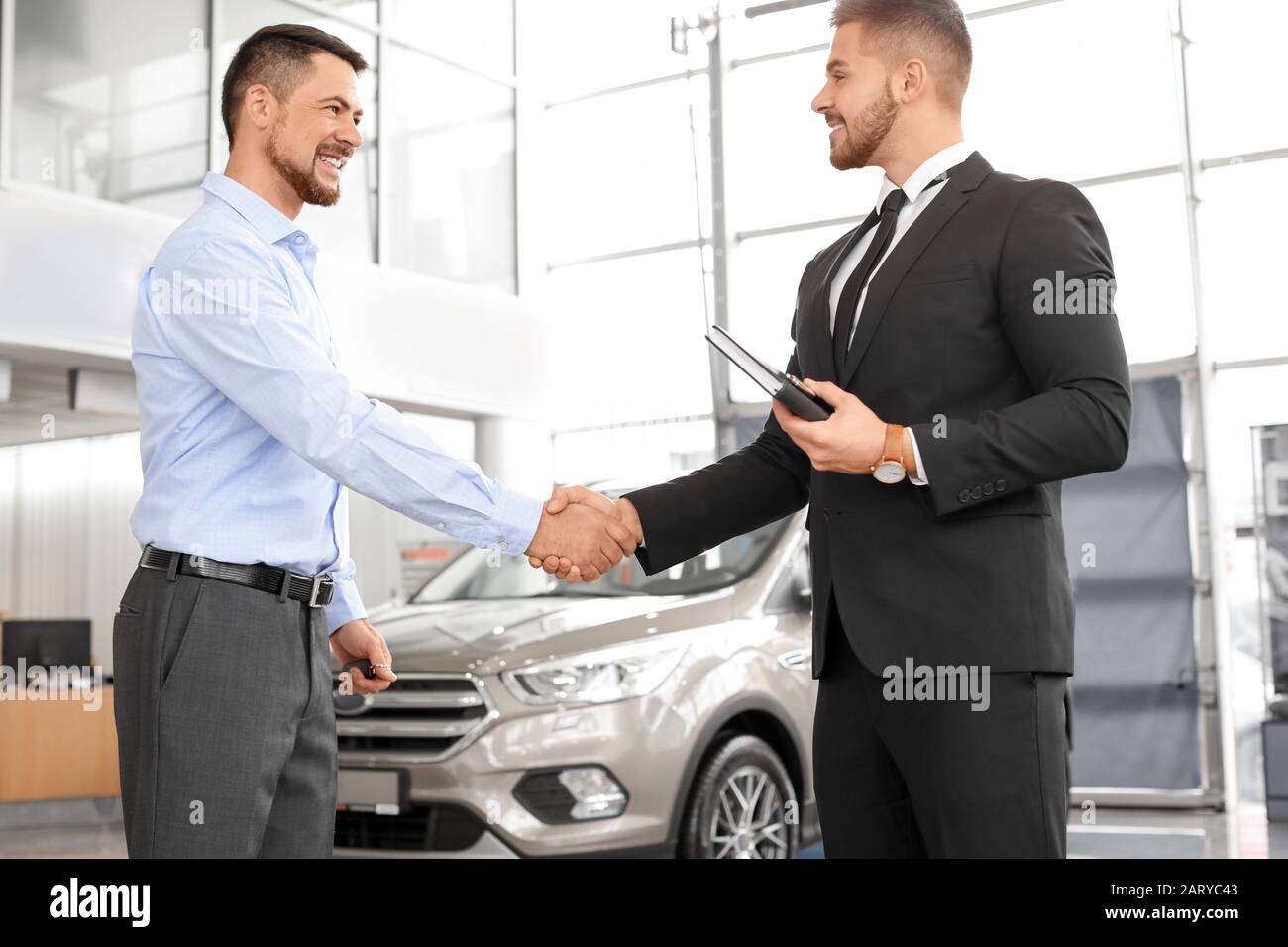 Man buying new car in salon Stock Photo - Alamy Man buying new car in salon Stock Photo - Alamy