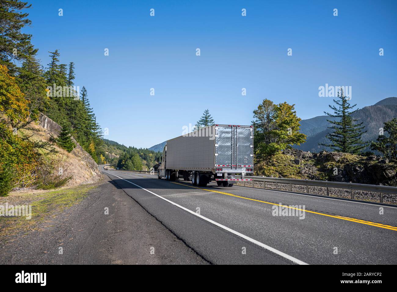 Classic white big rig heavy-duty long haul diesel semi truck with ...