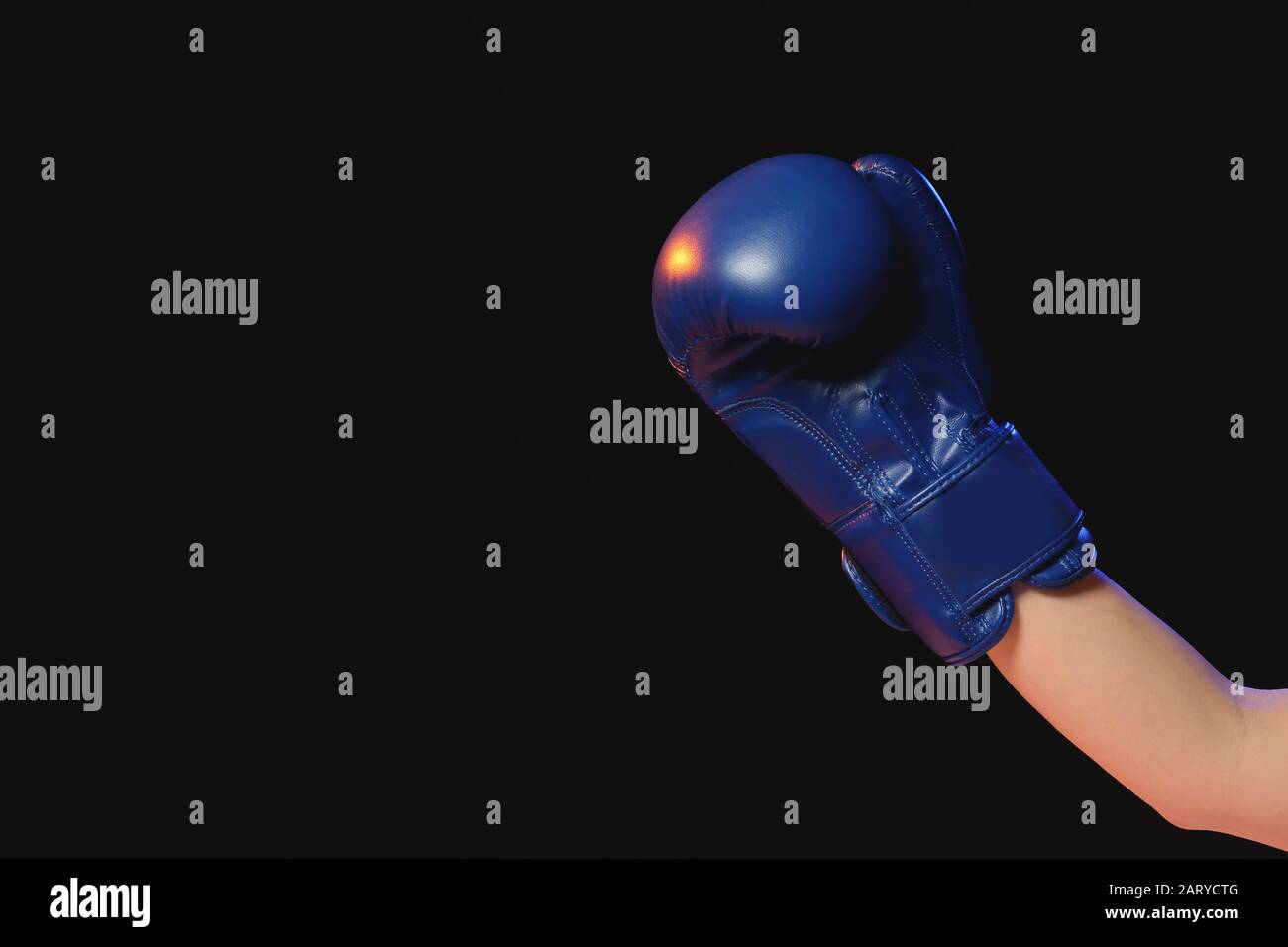 Hand in boxing glove hi-res stock photography and images - Alamy