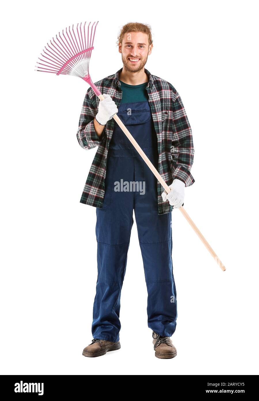 Man with rake for autumn leaves clean-up on white background Stock ...