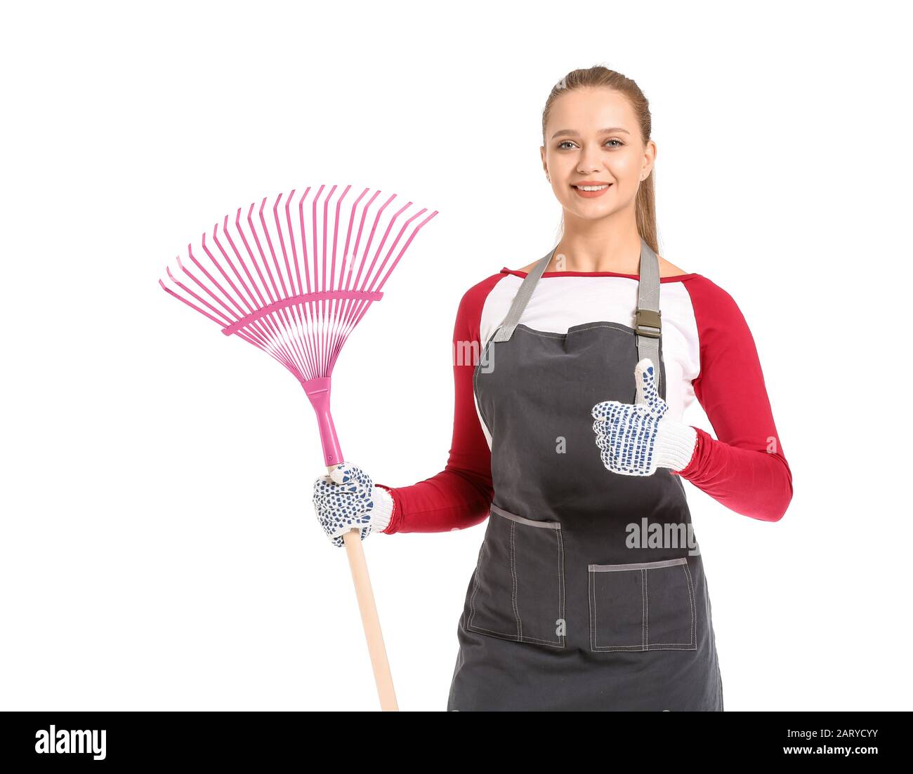 Woman with rake for autumn leaves clean-up on white background Stock ...