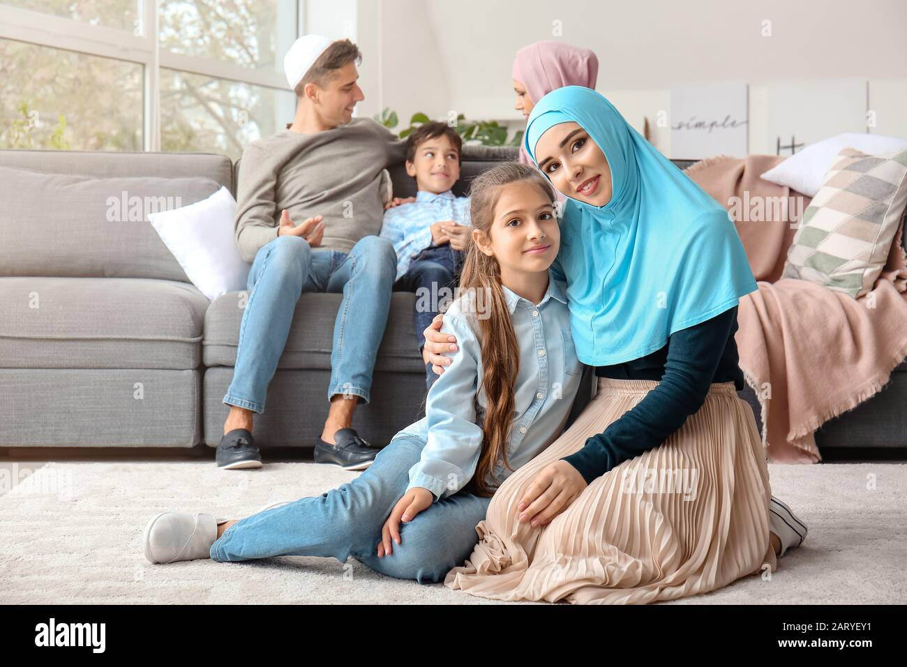 Muslim family portrait sofa hi-res stock photography and images - Alamy