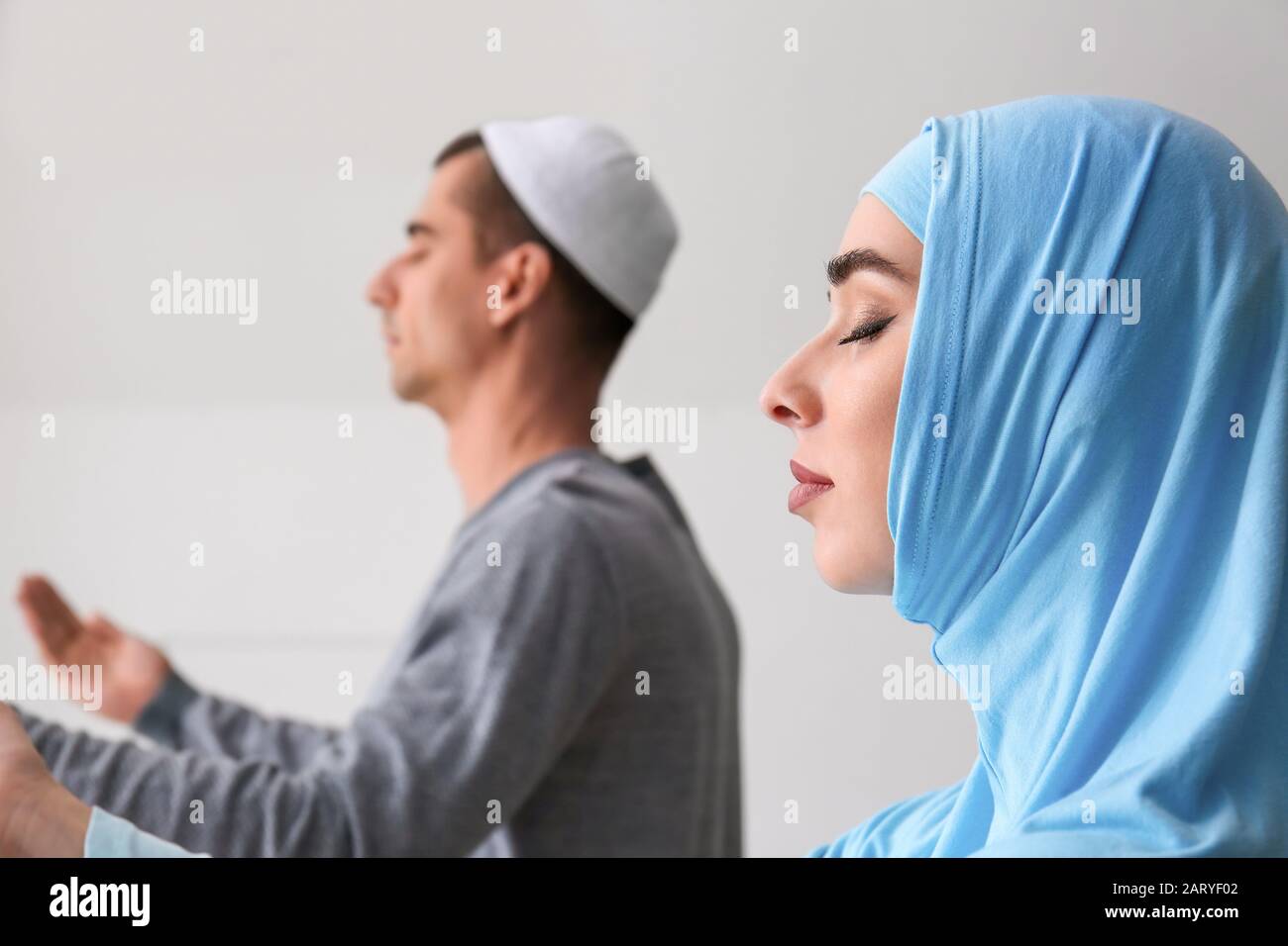 Muslim husband wife praying hi-res stock photography and images - Alamy