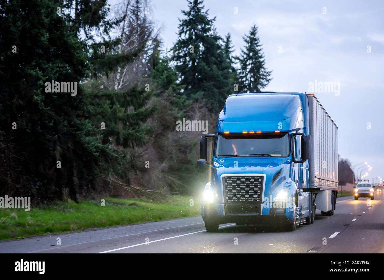 Big rig blue industrial diesel semi truck with grille guard ...