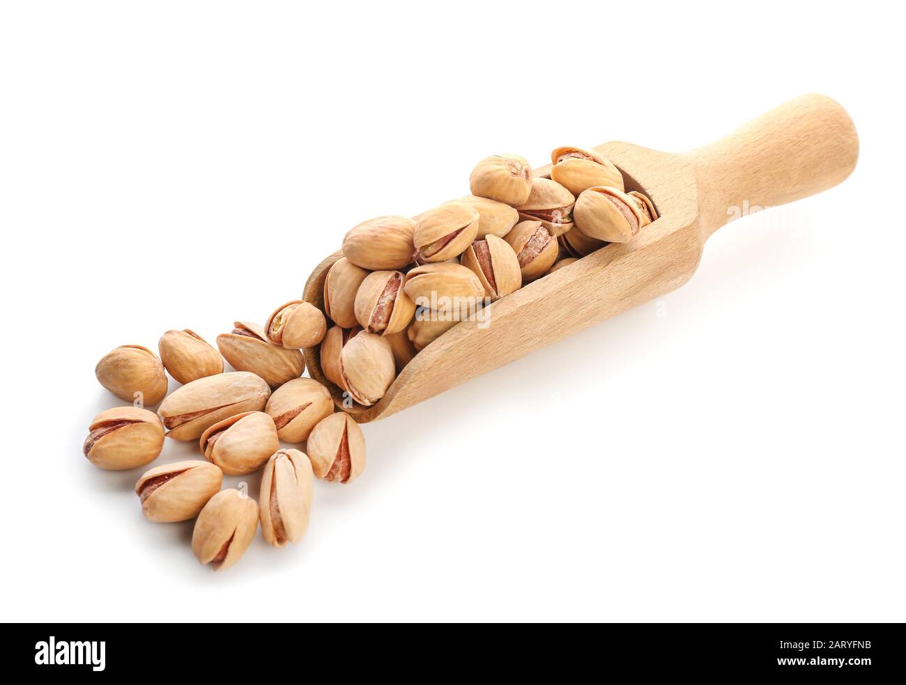 Scoop with tasty pistachio nuts isolated on white Stock Photo - Alamy