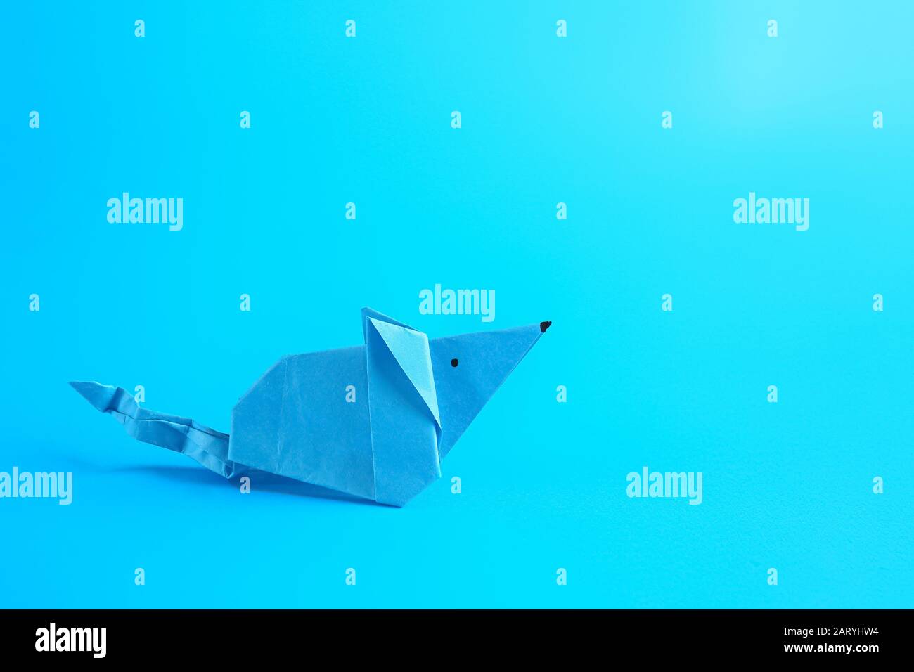 Origami rat on color background Stock Photo - Alamy