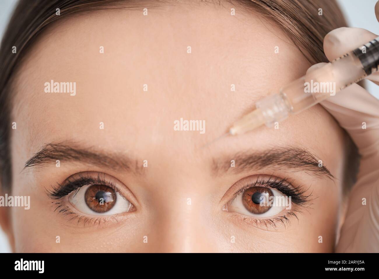 Young woman receiving filler injection, closeup Stock Photo - Alamy