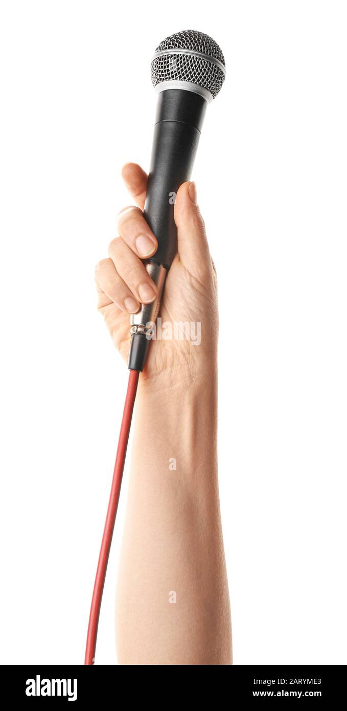 Female hand with microphone on white background Stock Photo - Alamy