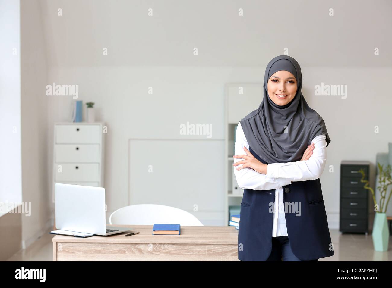 Beautiful Muslim student at the university Stock Photo - Alamy