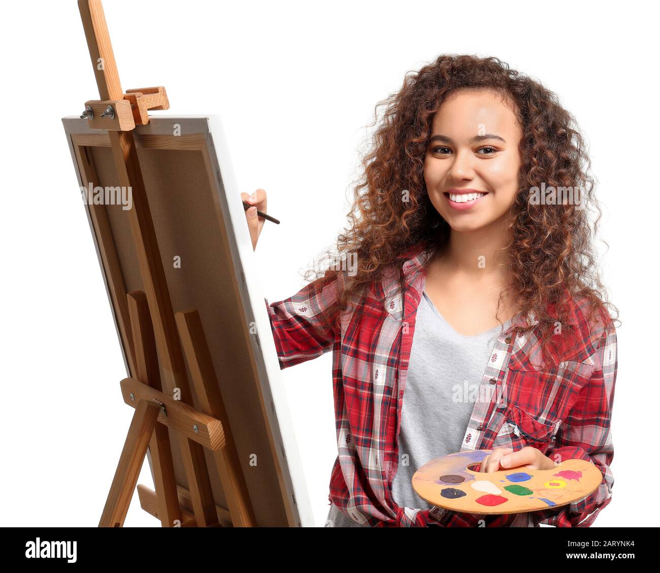 Beautiful female African-American artist isolated on white Stock Photo ...