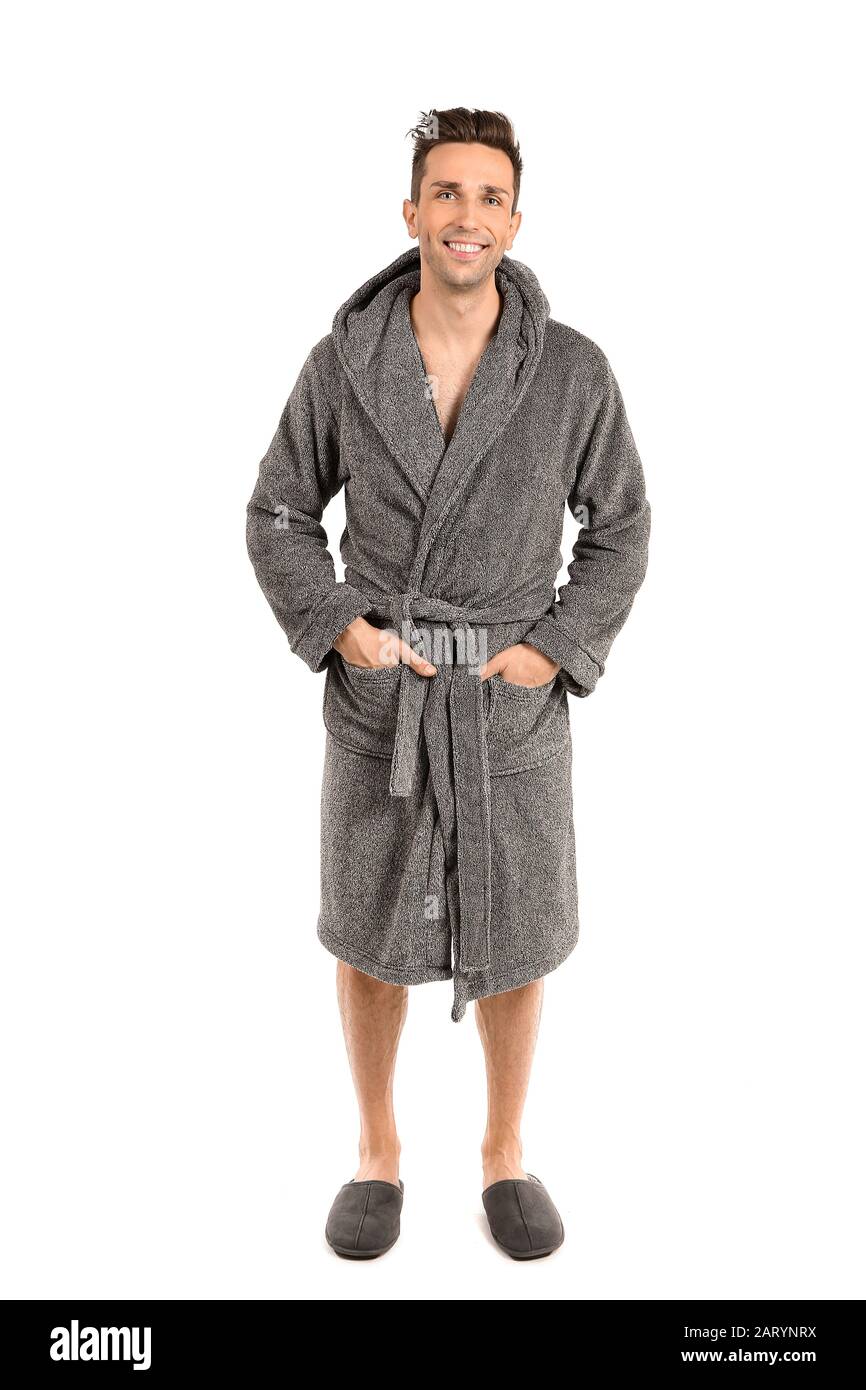 Handsome man in bathrobe on white background Stock Photo - Alamy