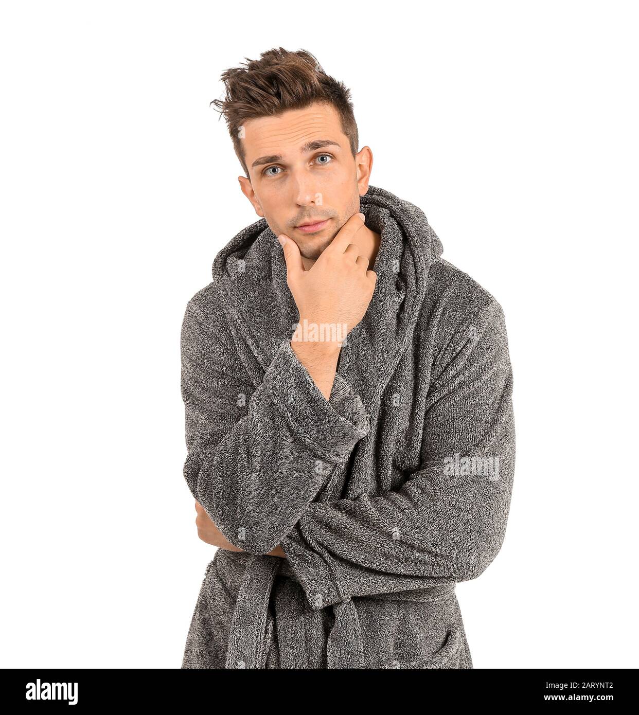 Handsome man in bathrobe on white background Stock Photo - Alamy
