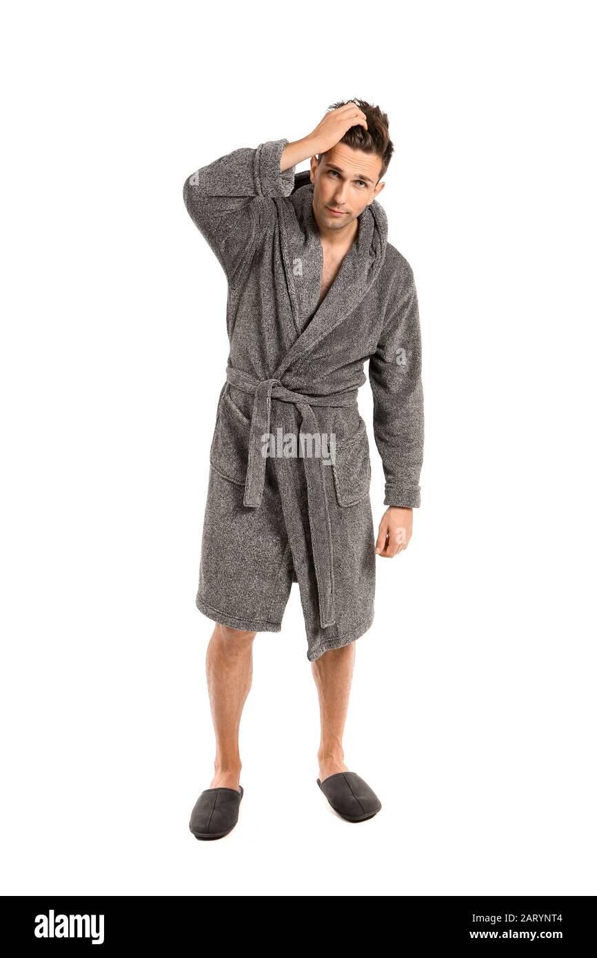 Handsome man in bathrobe on white background Stock Photo - Alamy