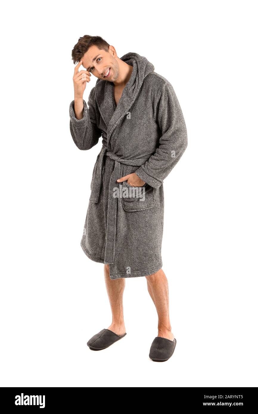 Handsome man in bathrobe on white background Stock Photo - Alamy
