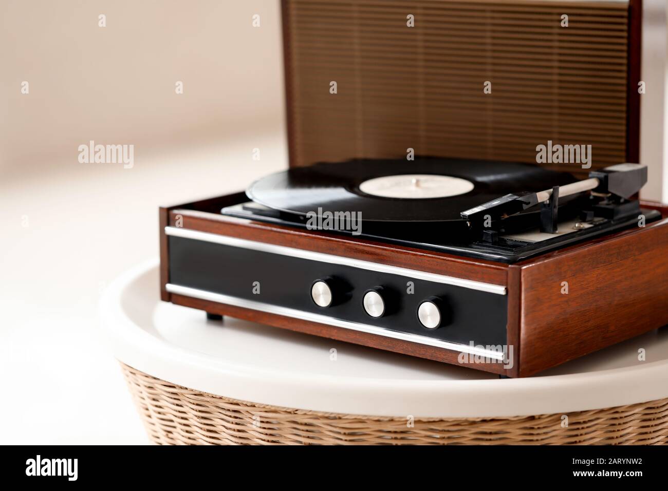 Record player on table in room Stock Photo - Alamy
