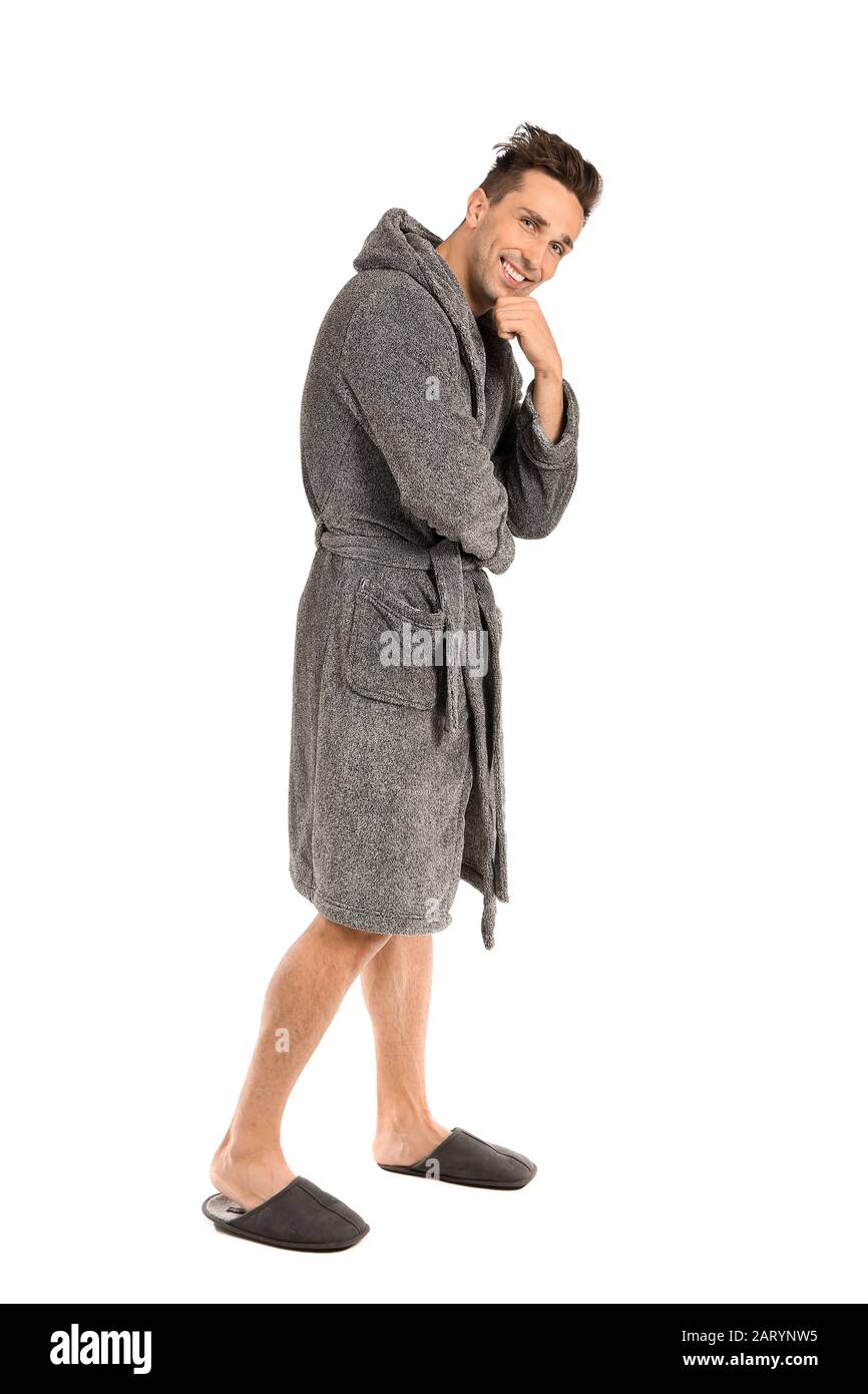 Handsome man in bathrobe on white background Stock Photo - Alamy