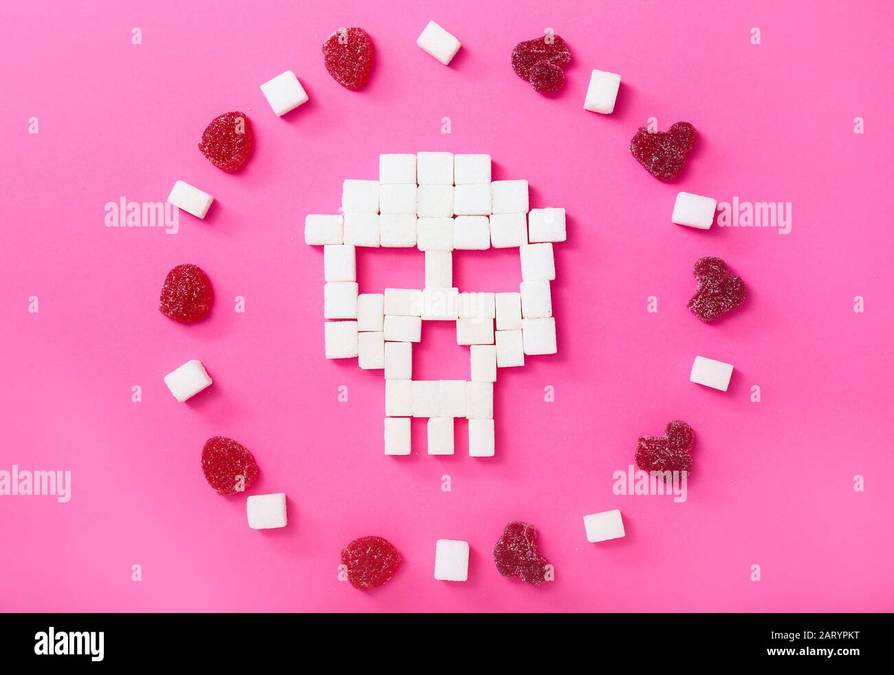 Human skull made of sugar on color background Stock Photo - Alamy