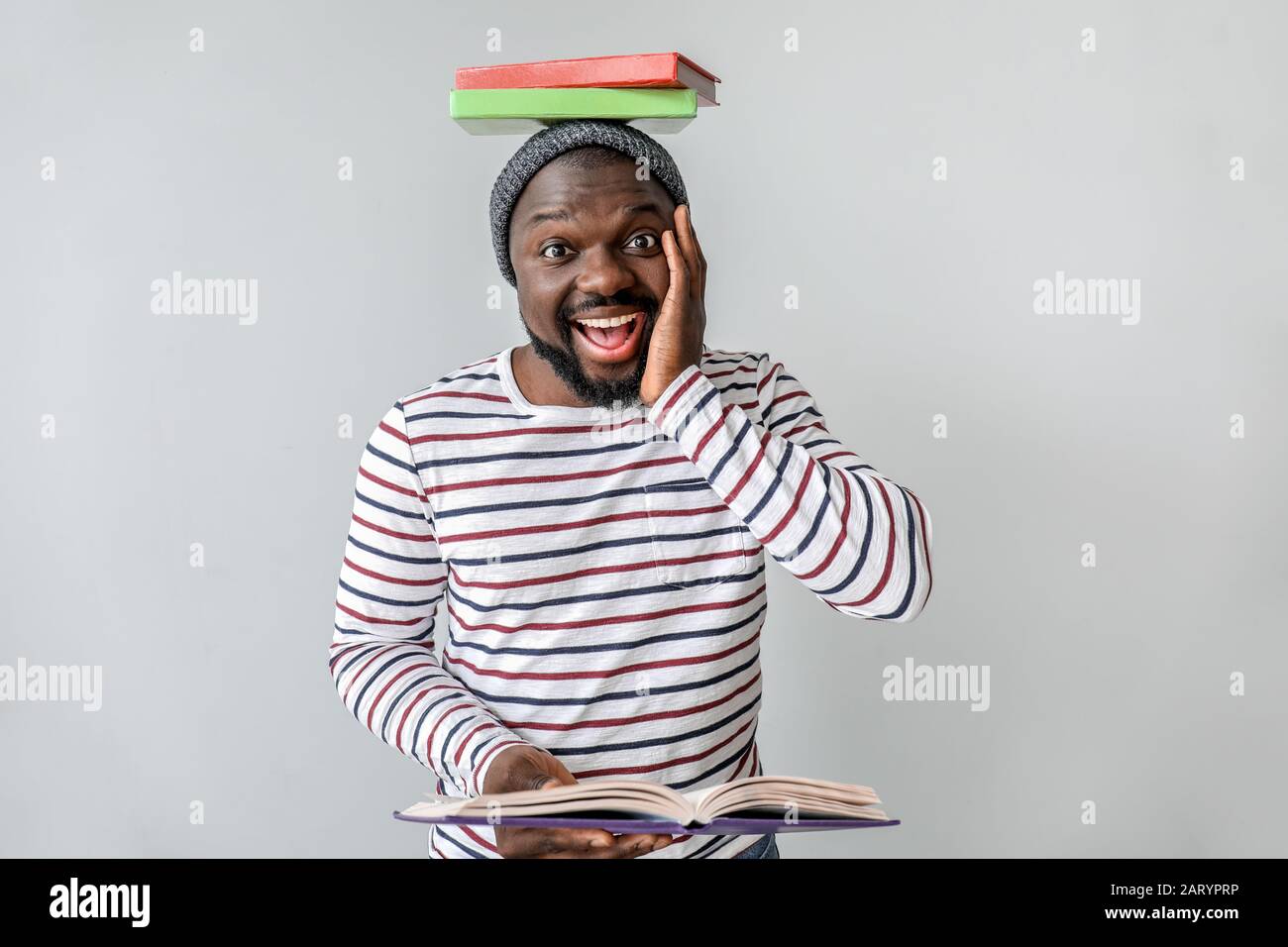 Surprised person reading book hi-res stock photography and images - Alamy