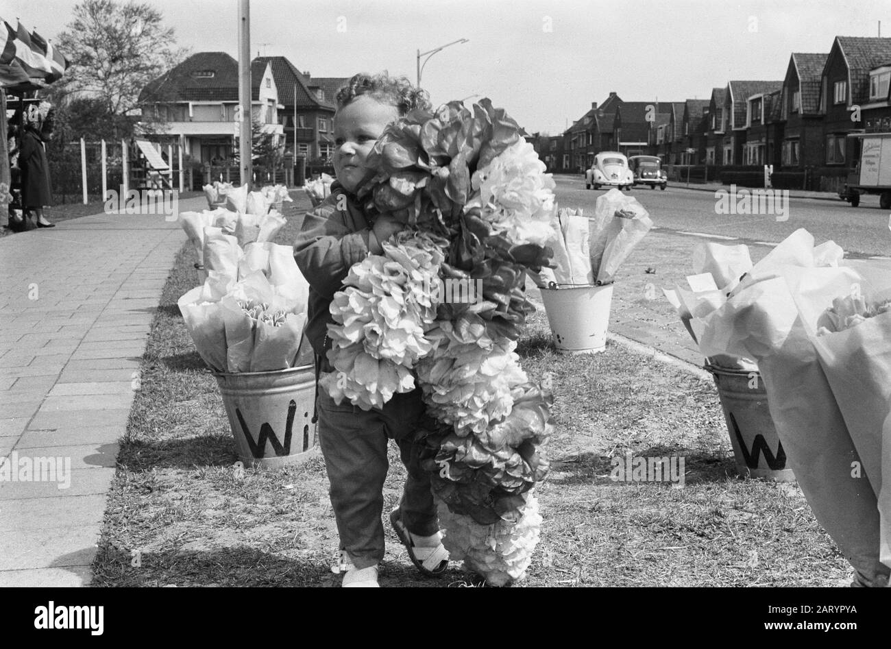 Two-year-old Michel sells in flower booth of father Date: May 10, 1962 ...
