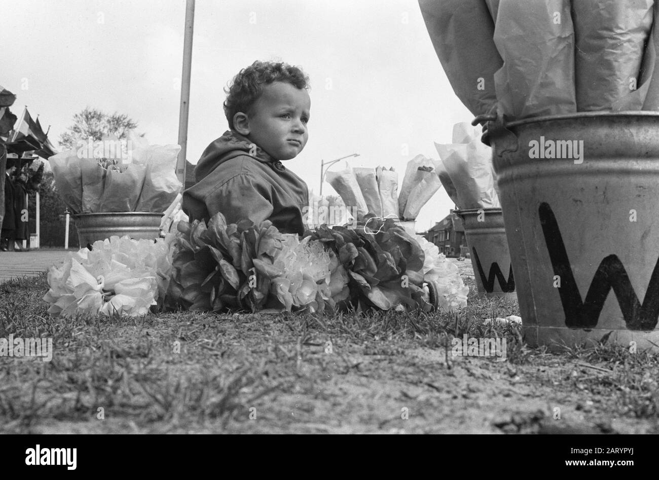 Two-year-old Michel sells in flower booth of father Date: May 10, 1962 ...
