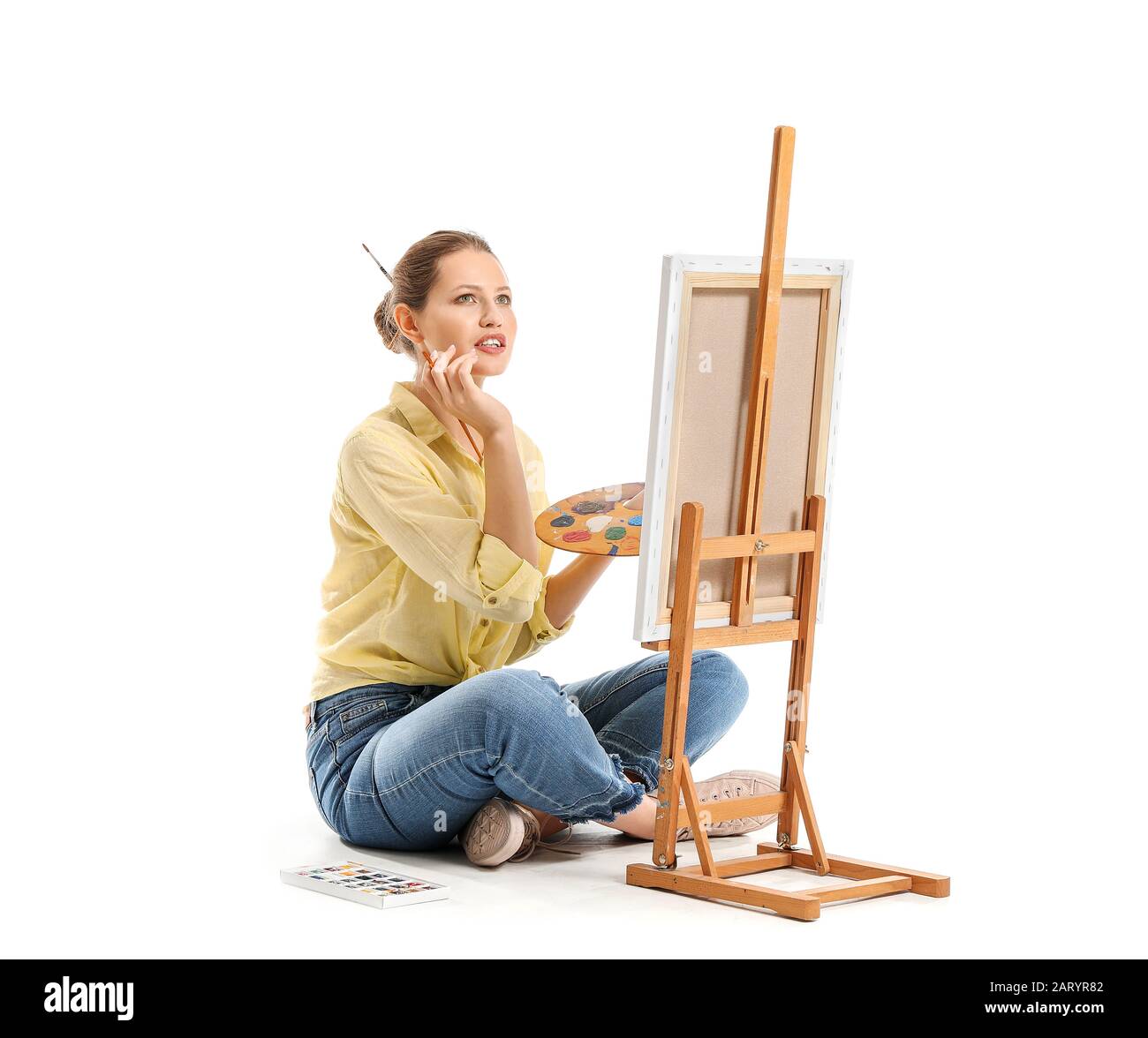 Young female artist isolated on white Stock Photo - Alamy