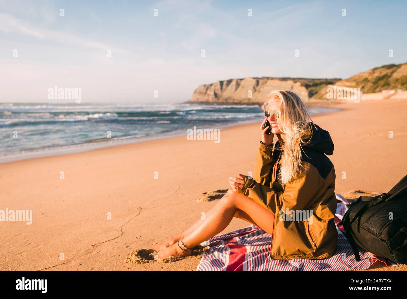Women talking on the beach hi-res stock photography and images - Alamy