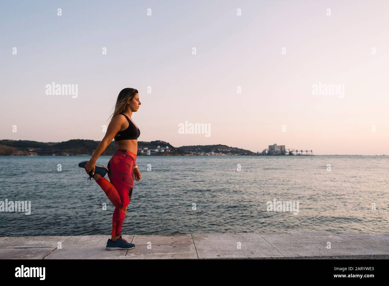 Side view women stretching hi-res stock photography and images - Alamy