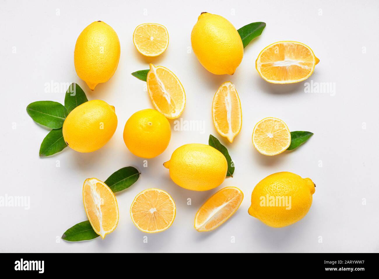 Ripe lemons on white background Stock Photo - Alamy