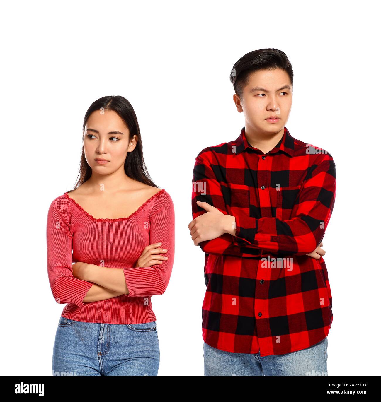 Quarrelled Asian couple on white background Stock Photo - Alamy