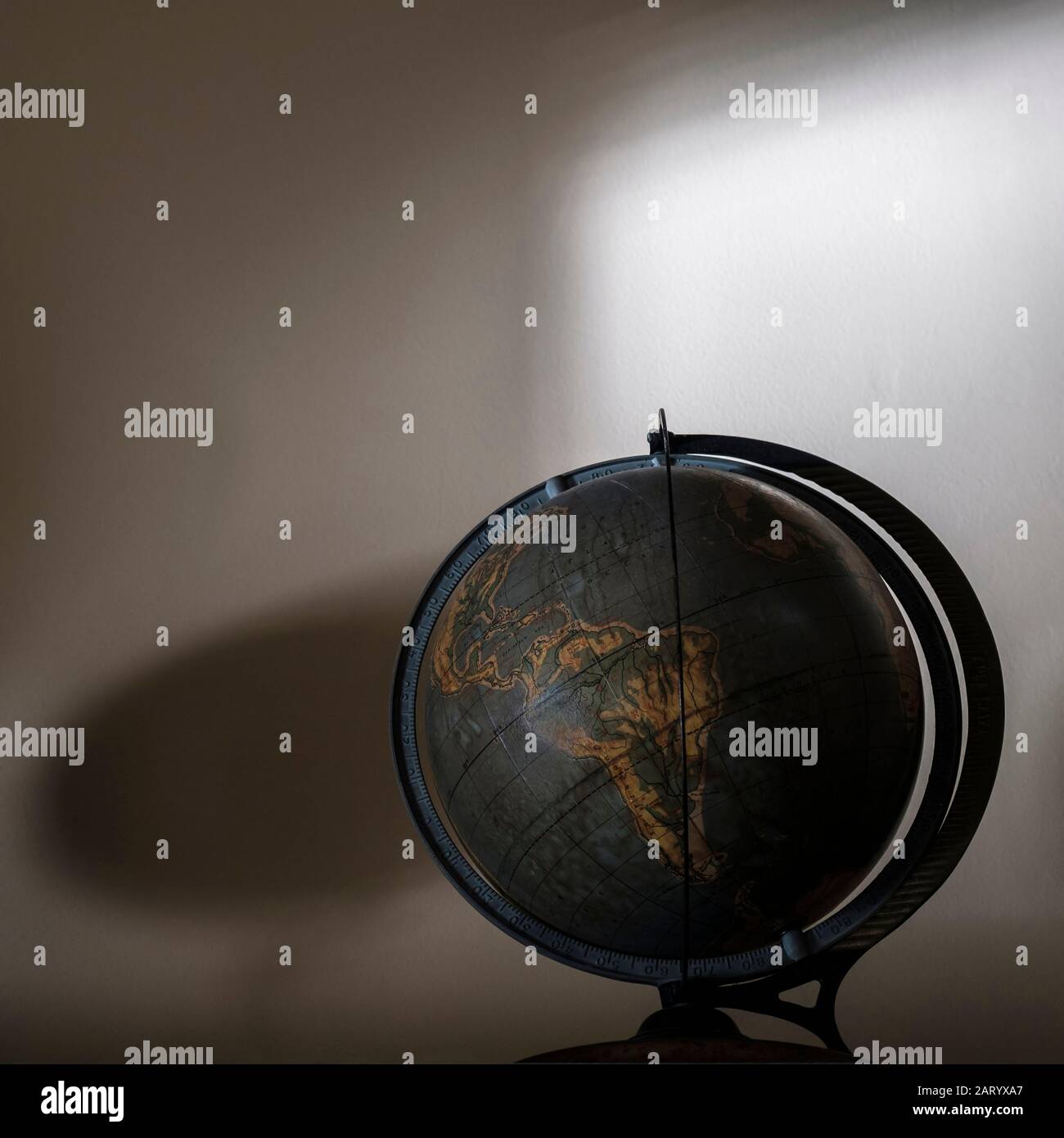 Globe in shadow Stock Photo - Alamy
