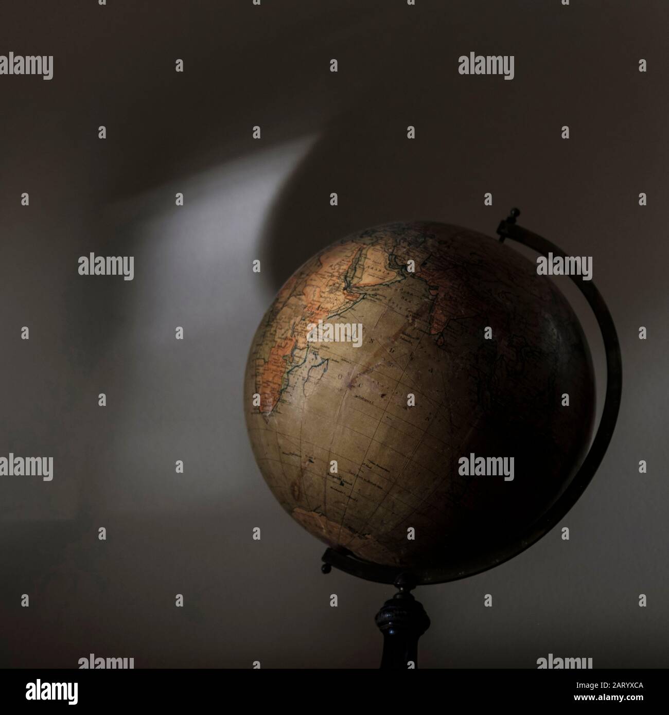 Globe in shadow Stock Photo - Alamy