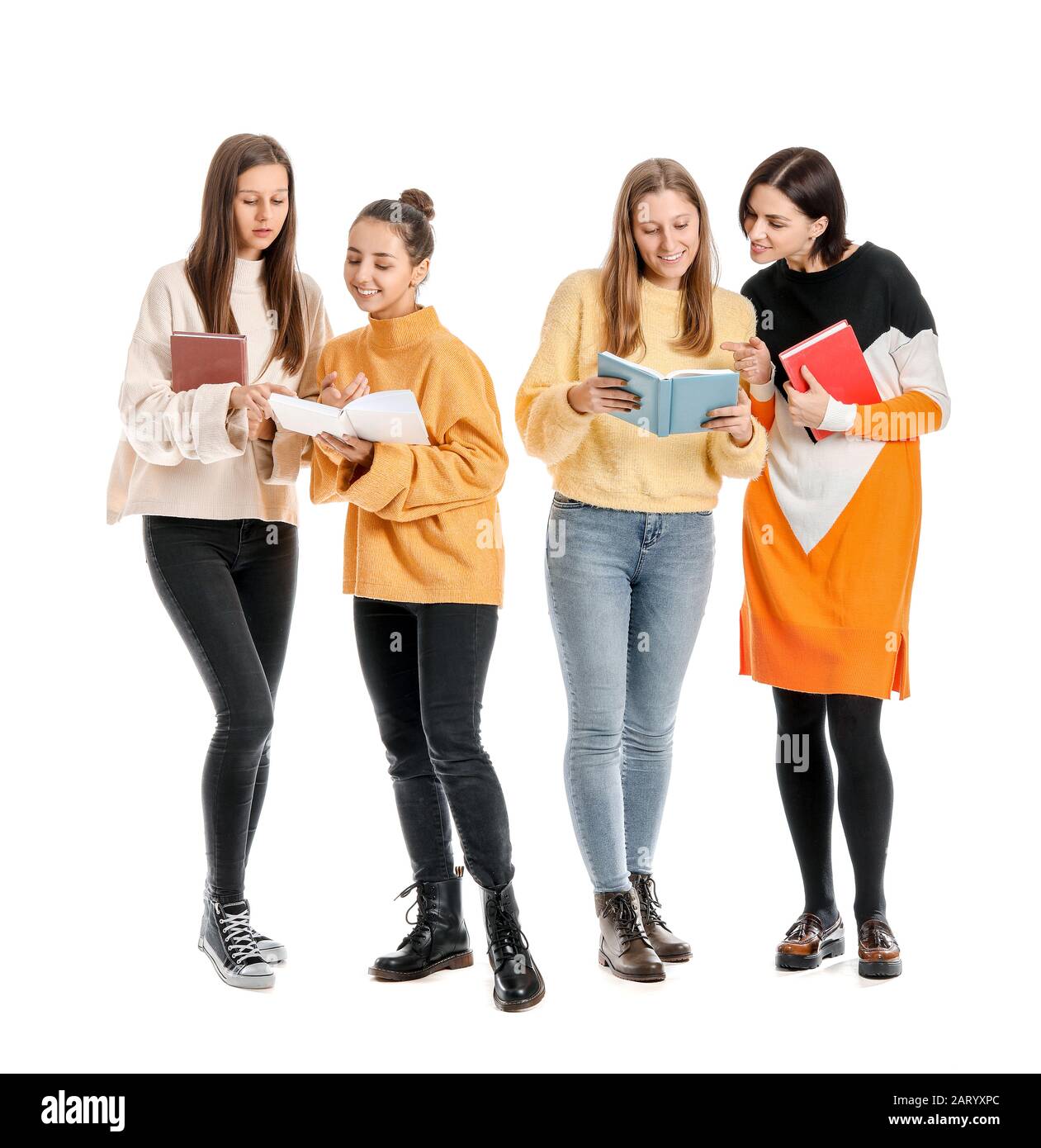 Young women with books on white background Stock Photo - Alamy