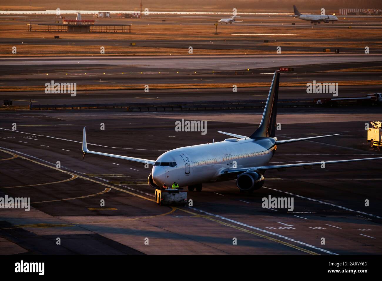 Airplane on runway Stock Photo - Alamy