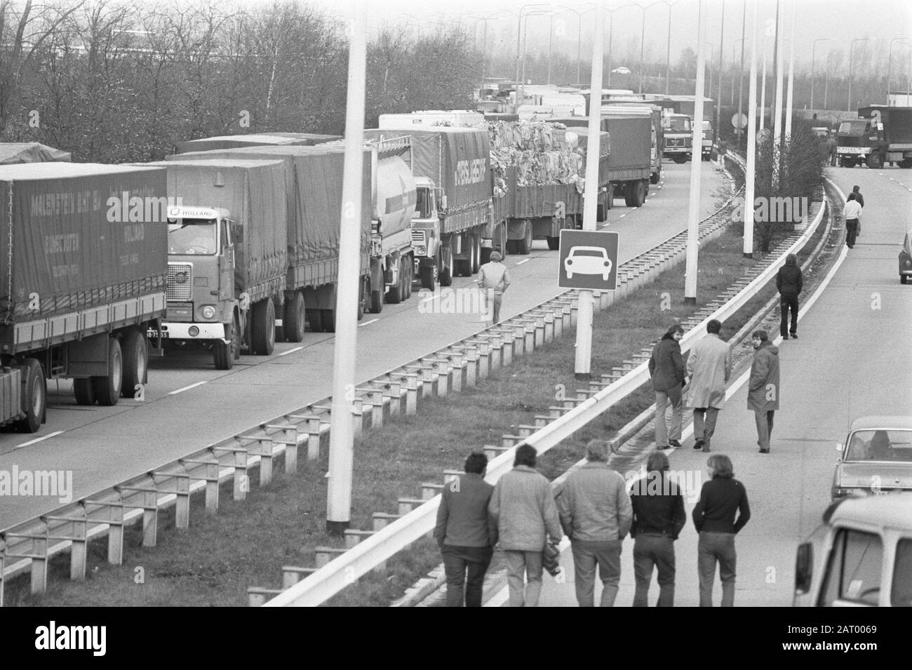 Truck drivers block border crossing from protest against mandatory ...