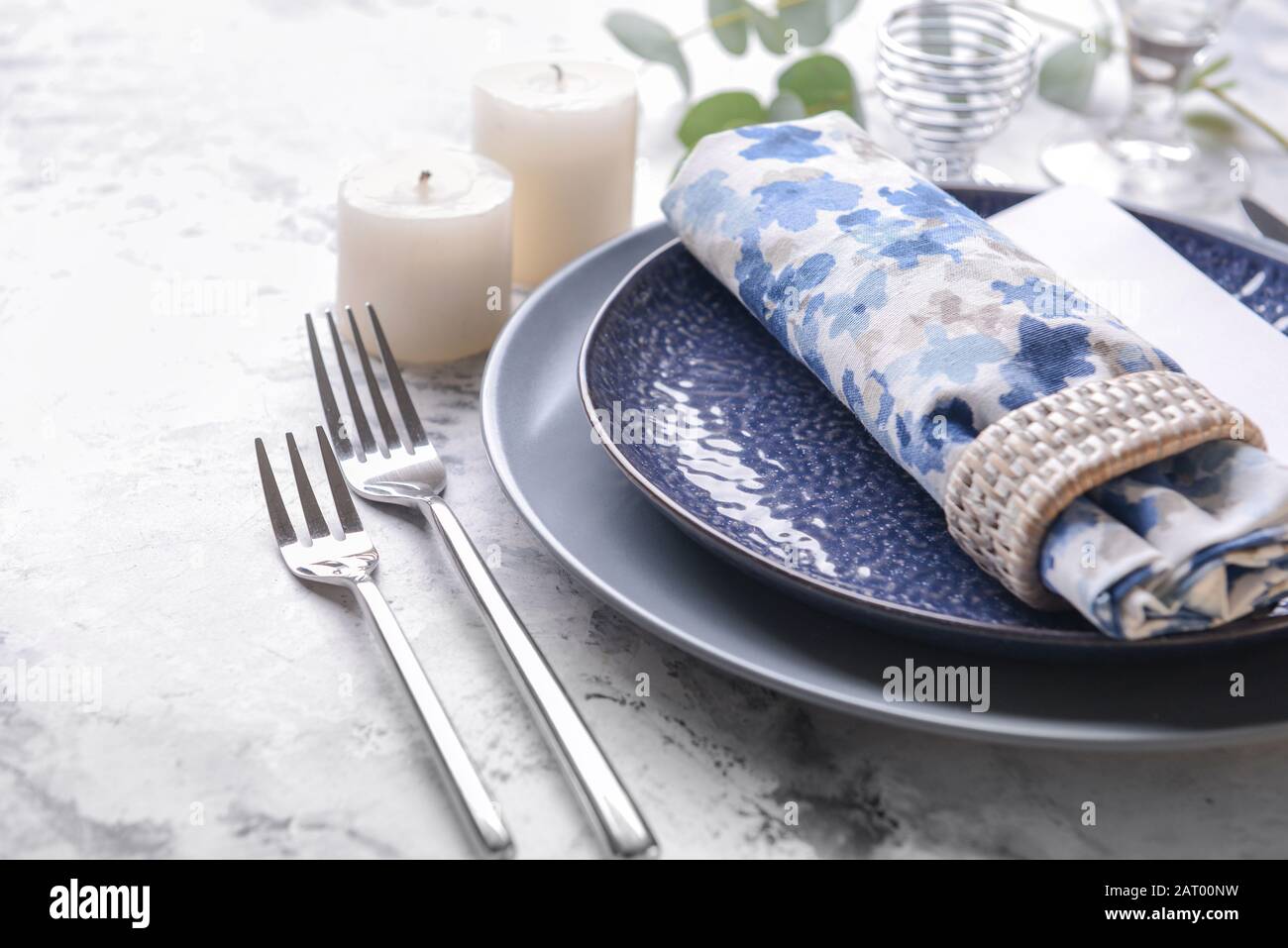 Beautiful table setting on white background Stock Photo - Alamy