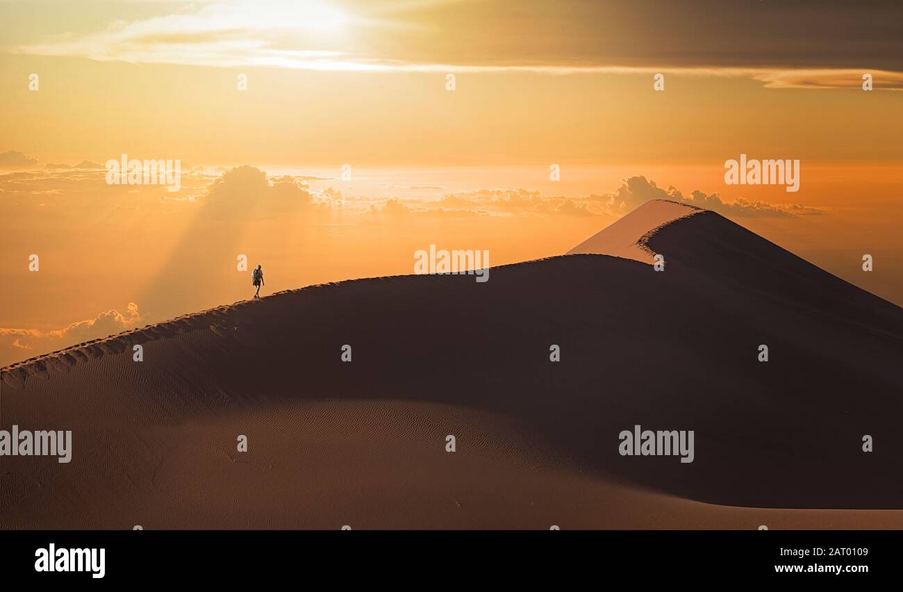 Man in desert in Namib Desert in Namibia Stock Photo - Alamy
